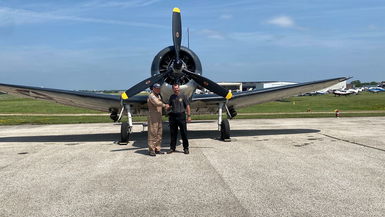 Fond du Lac sheriff flies in same dive bomber as grandfather