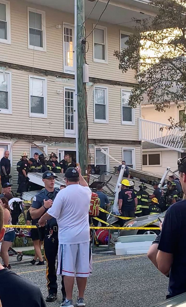 The Latest: At least 22 people injured in deck collapse