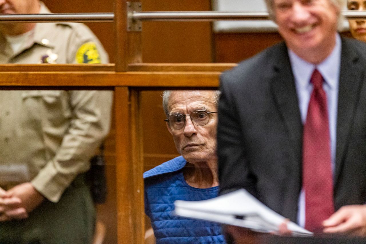 The Latest: Charges detail overdoses at activist's home