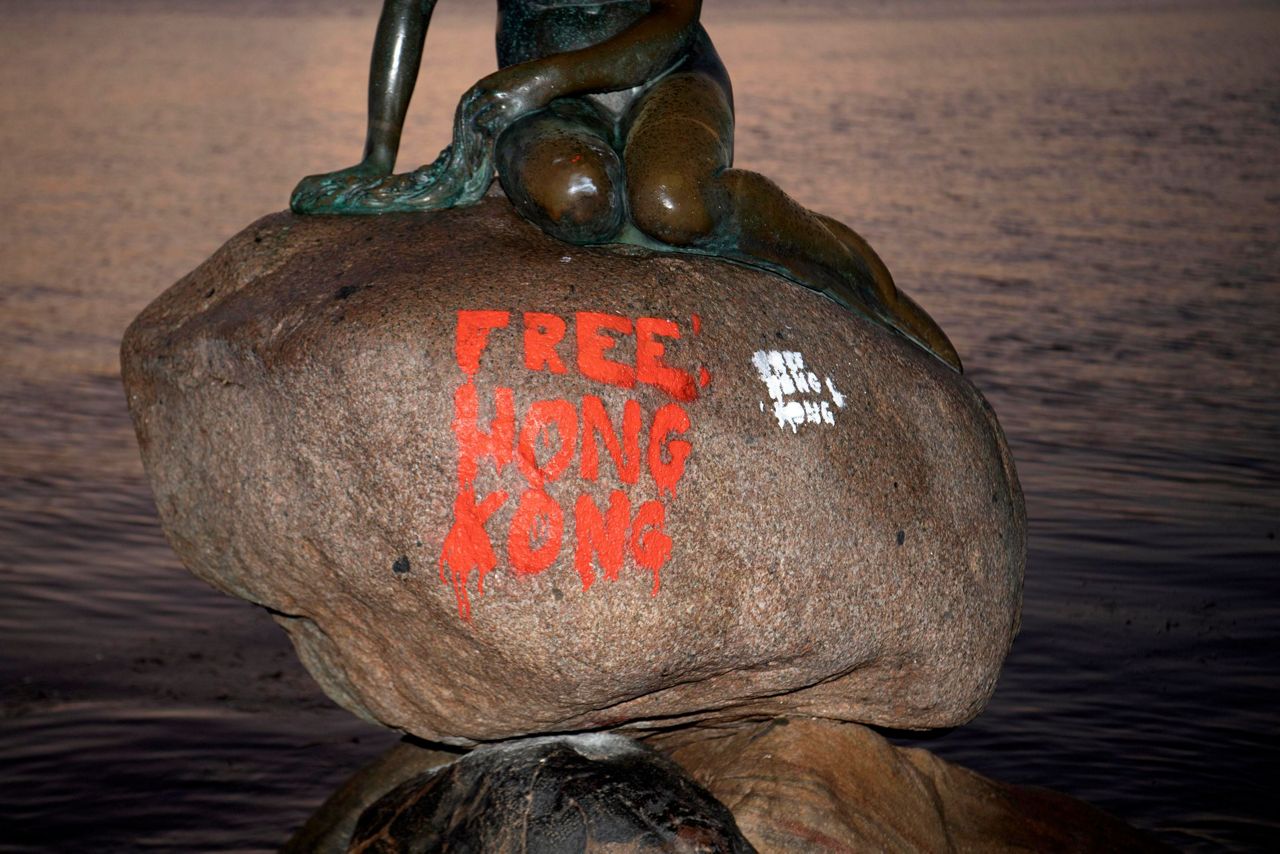 Graffiti painted on Copenhagen's Little Mermaid statue