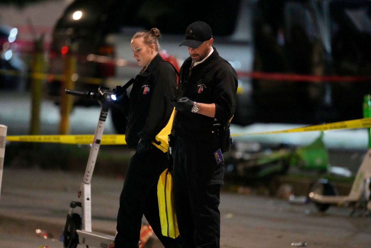 9 people hurt in Denver shooting and suspect taken into custody, police say