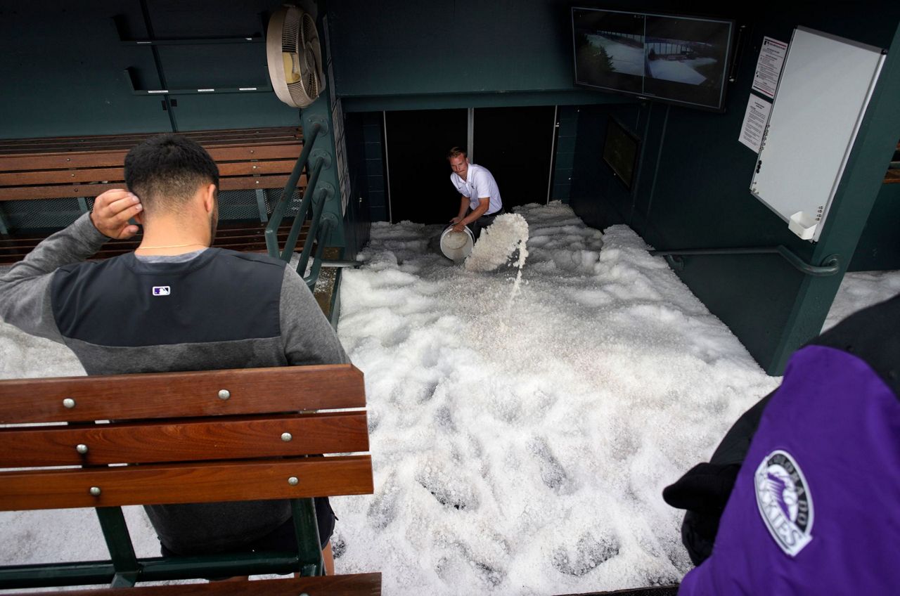 All Hail the Rockies! Pea-sized hail makes Coors Field a winter ...