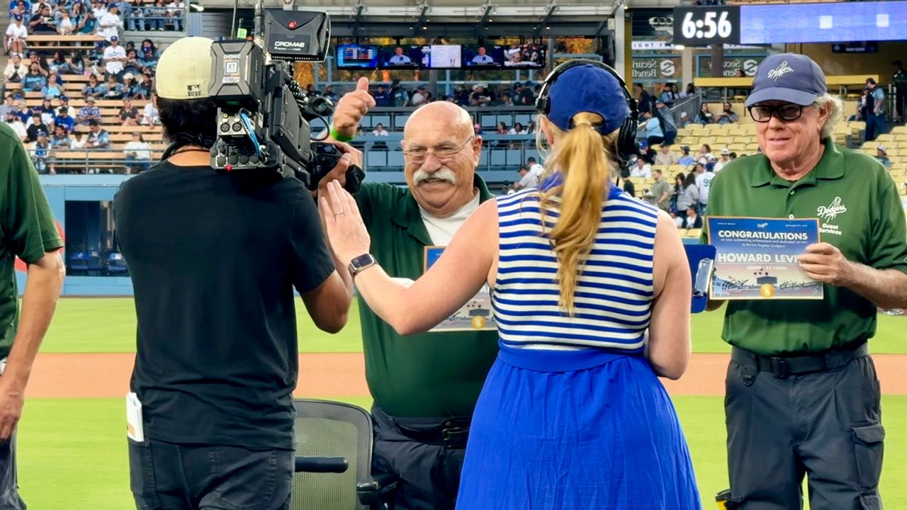 Dodgers usher celebrates 50 years with team