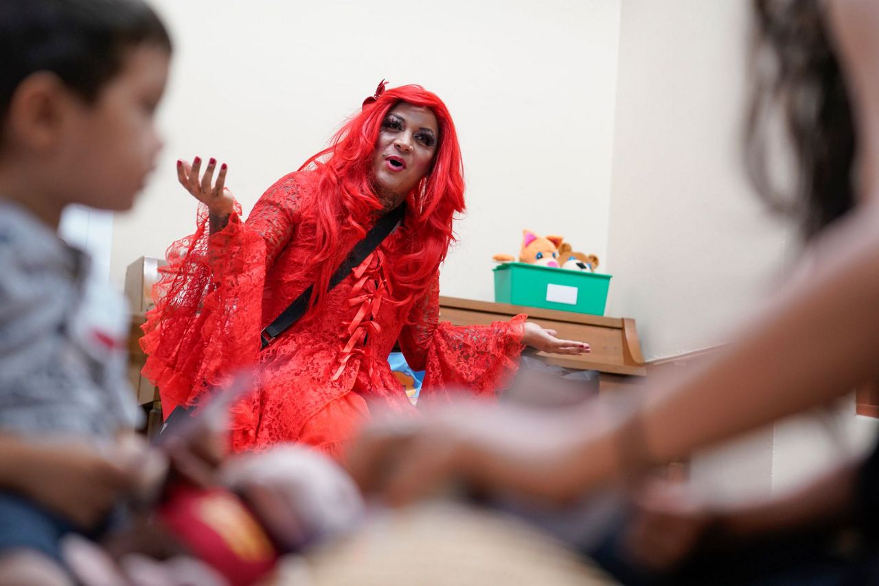Drag story hour hosts, under attack, dig in their heels