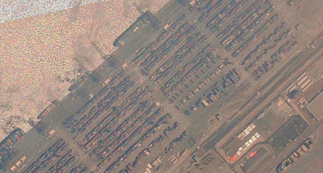 Firefighters douse ship that exploded at major port in Dubai