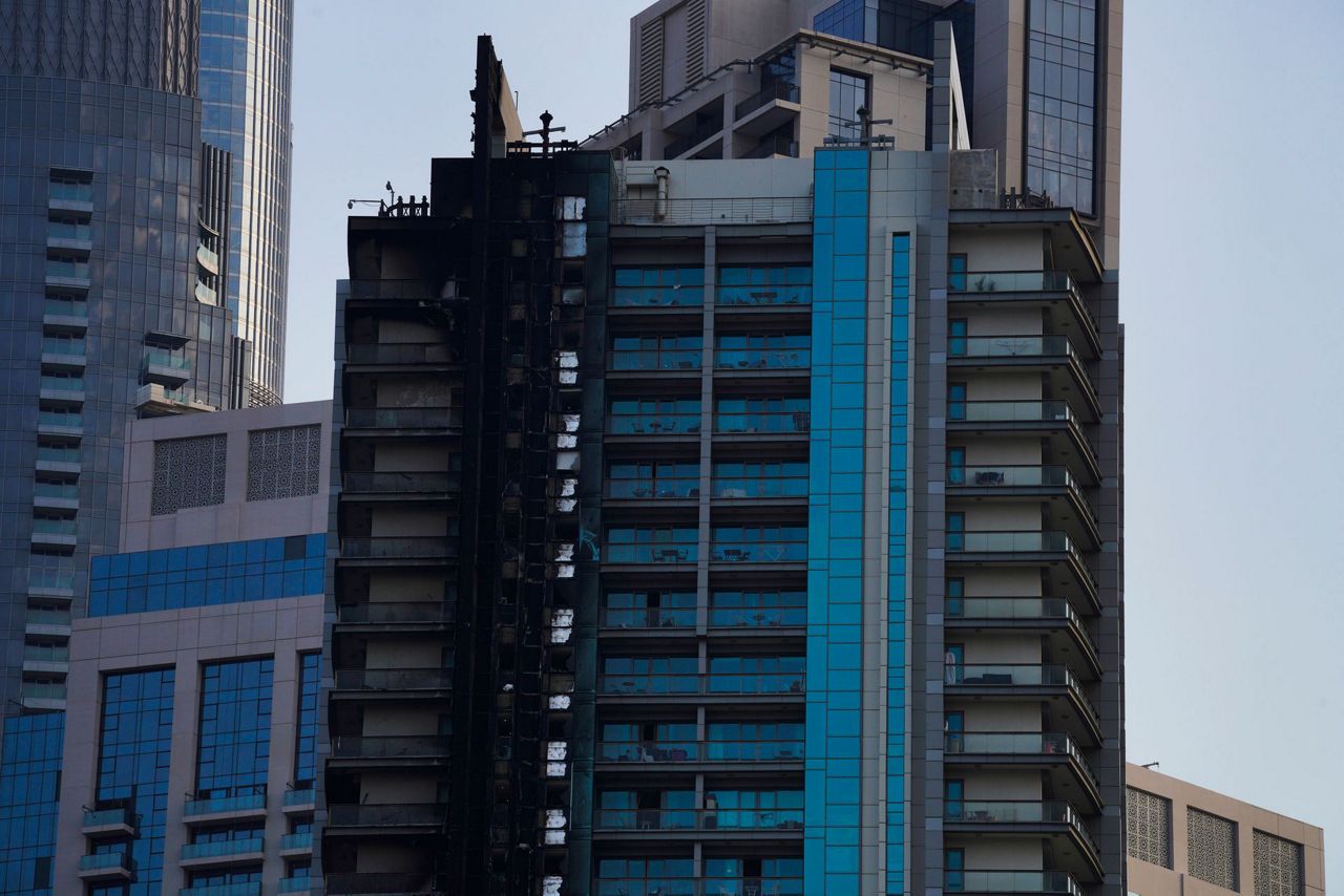 Dubai fire races up high-rise near world's tallest building