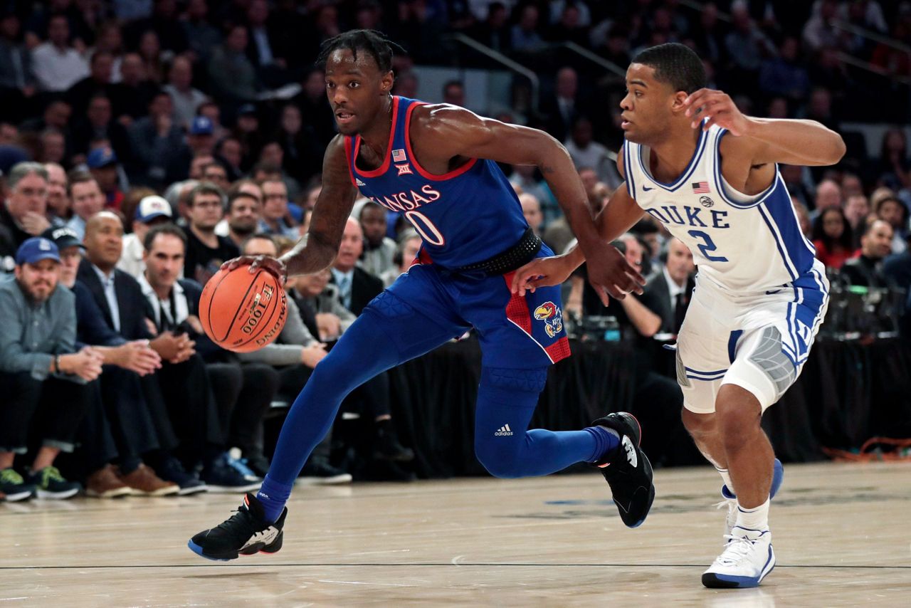 No. 4 Duke edges third-ranked Kansas 68-66