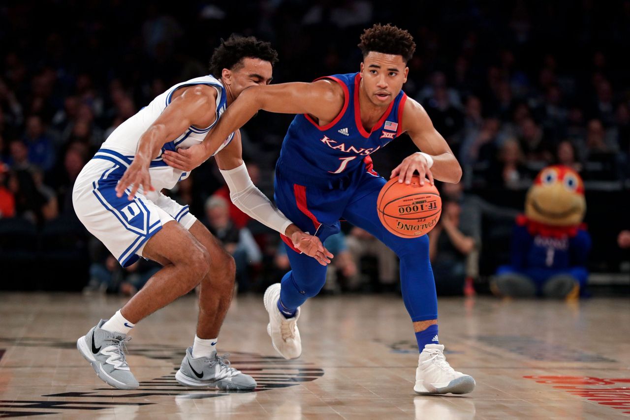 No. 4 Duke edges third-ranked Kansas 68-66