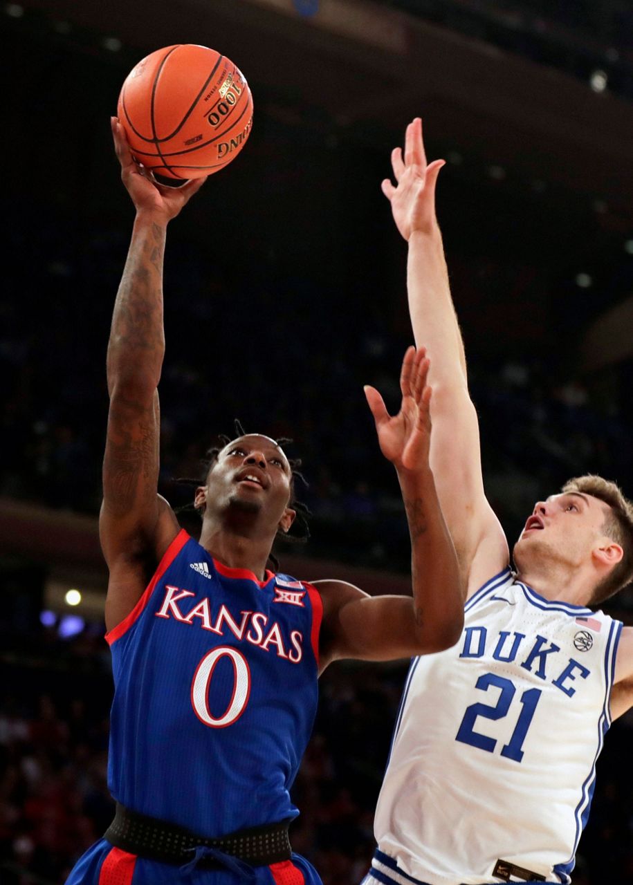 No. 4 Duke edges third-ranked Kansas 68-66