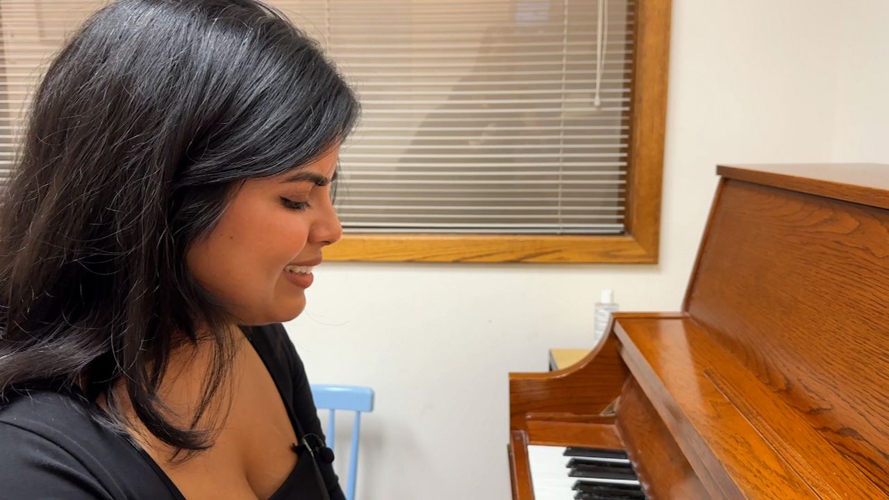 ER doctor singing national anthem at Bengals preseason game