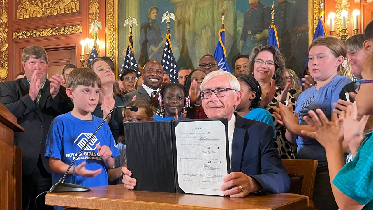 Gov. Evers signs state budget, noting several vetoes