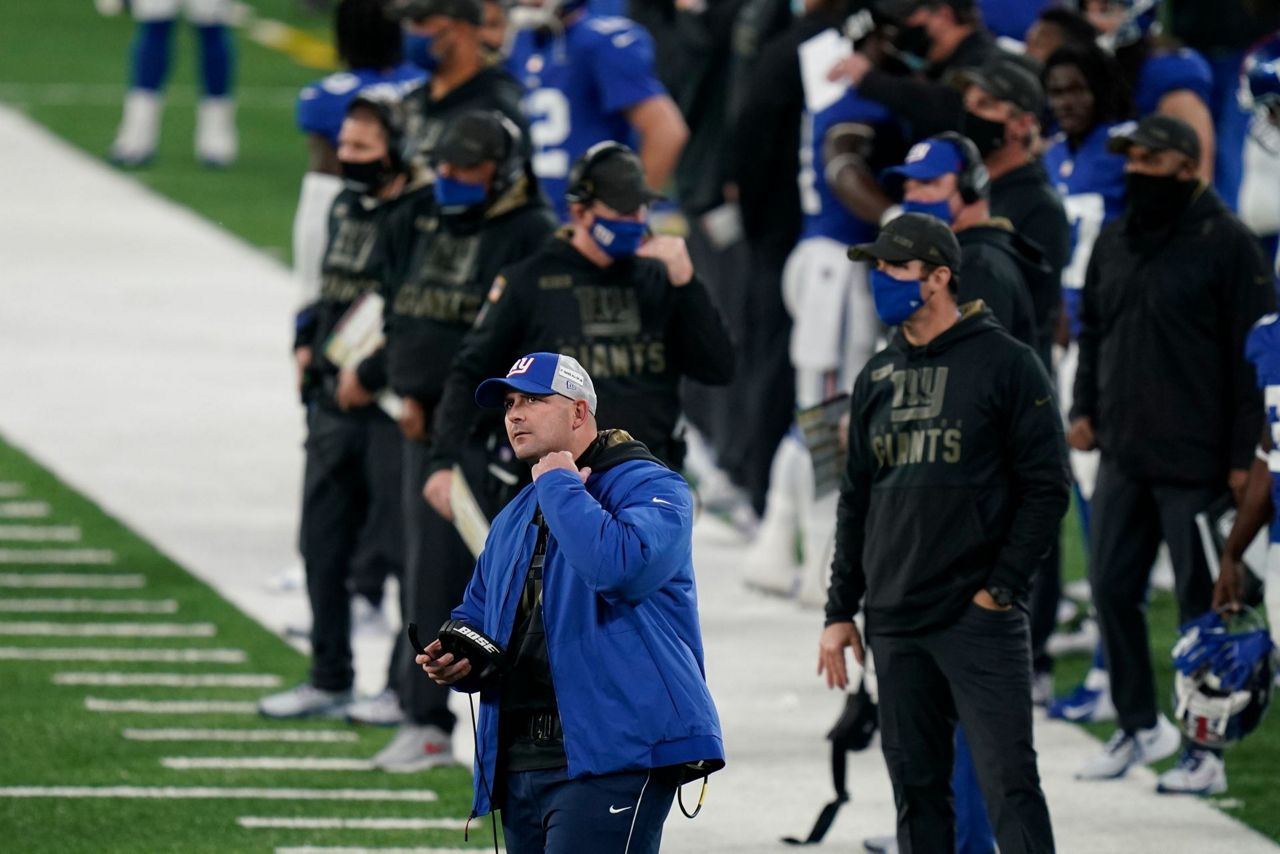 AP source: Giants fire offensive line coach Marc Colombo