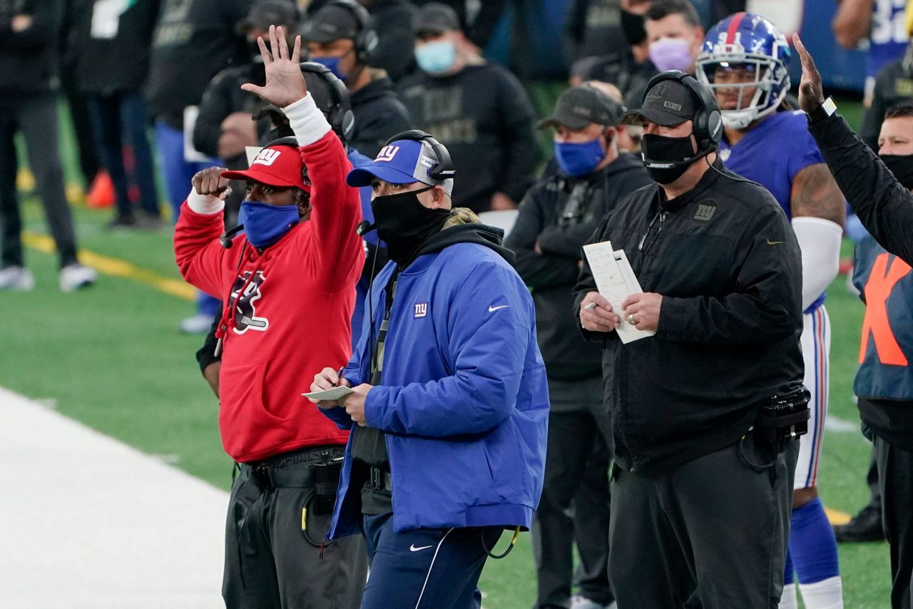 AP source: Giants fire offensive line coach Marc Colombo