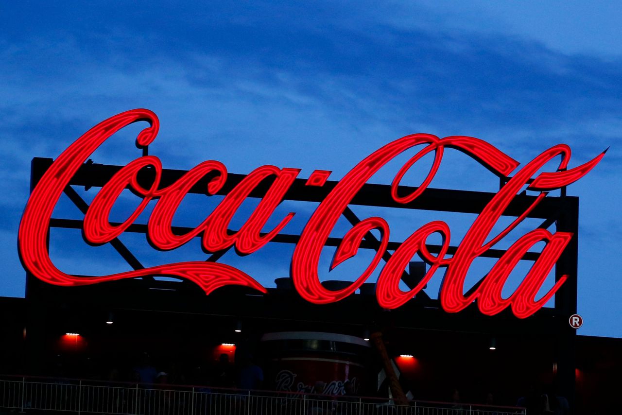 Coke shares hit all-time high as new drinks win customers