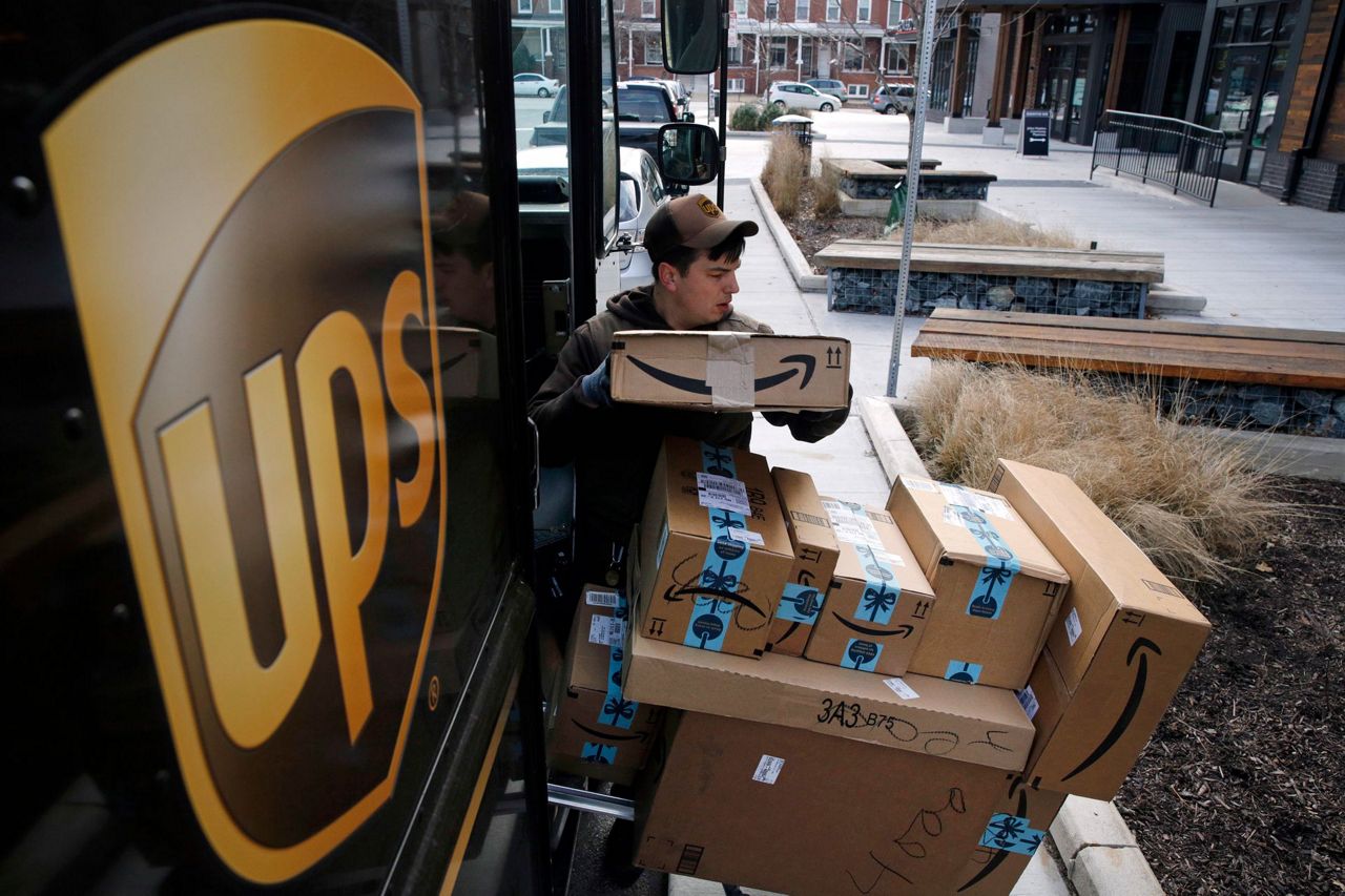 UPS falls short of forecasts on bad weather, costs