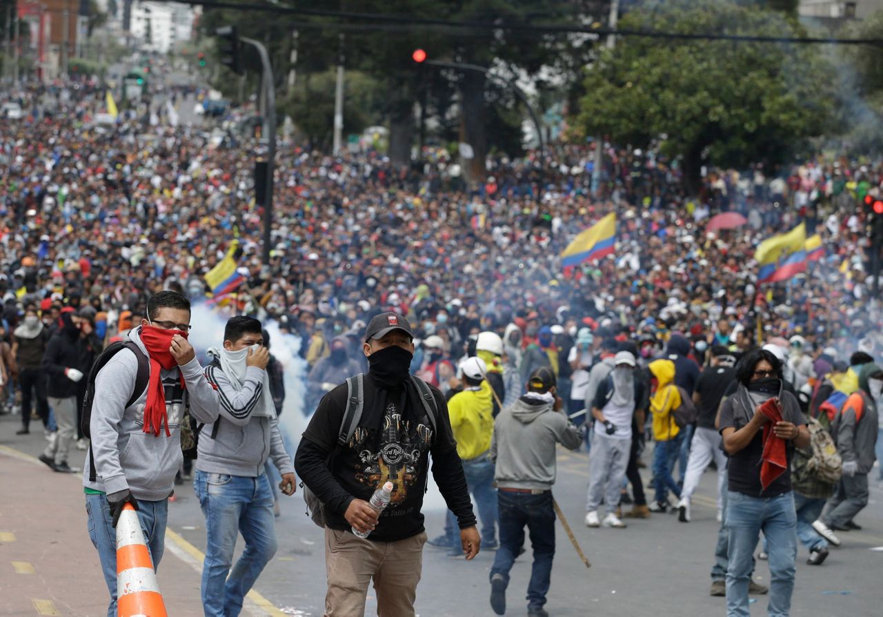 Ecuador's leader moves government seat as clashes escalate