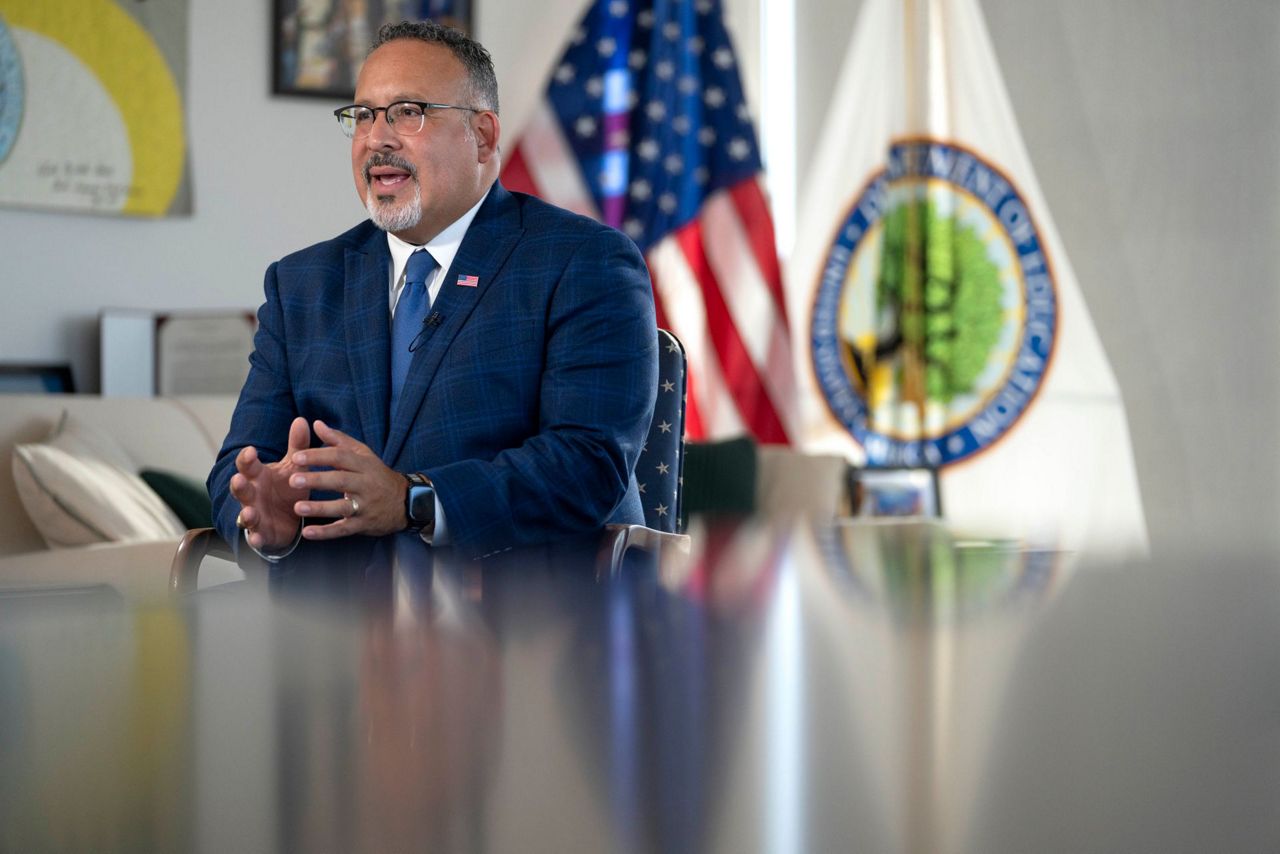 US education chief considers new ways to discourage college admissions ...