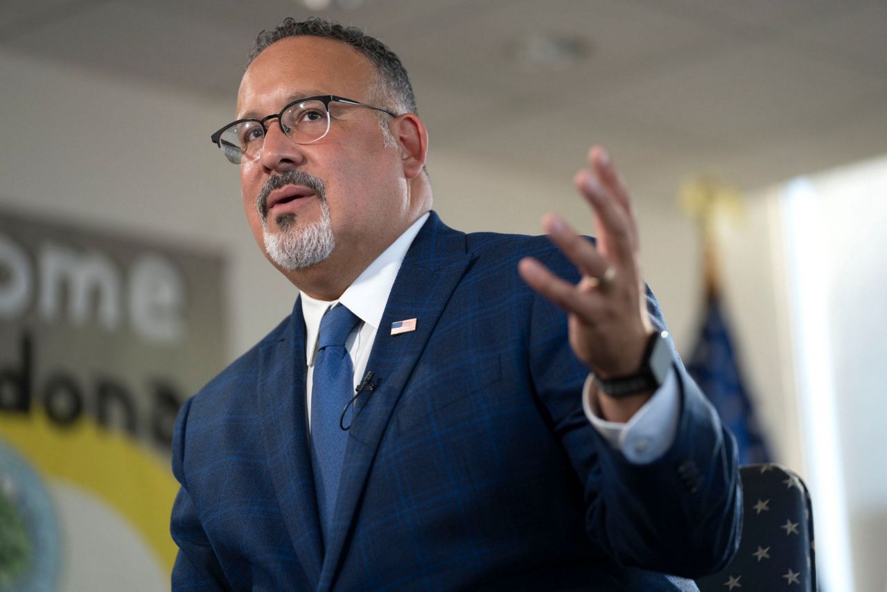 US education chief considers new ways to discourage college admissions ...