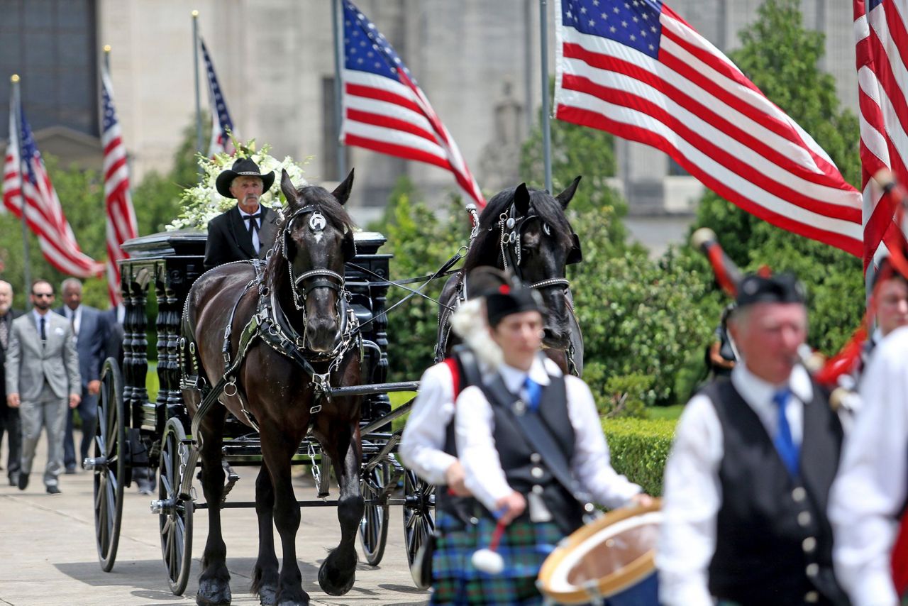 Final parade: Ex-Gov. Edwards carried to funeral site