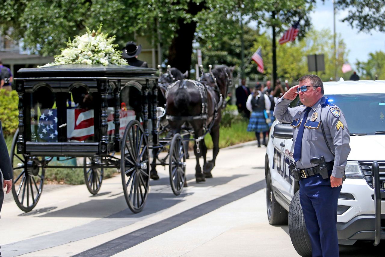 Final parade: Ex-Gov. Edwards carried to funeral site