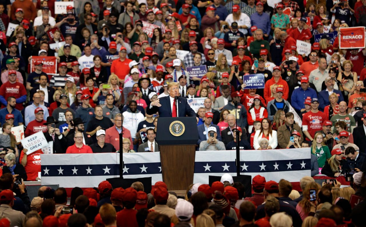 The Latest: Trump urges supporters to vote, knocks media