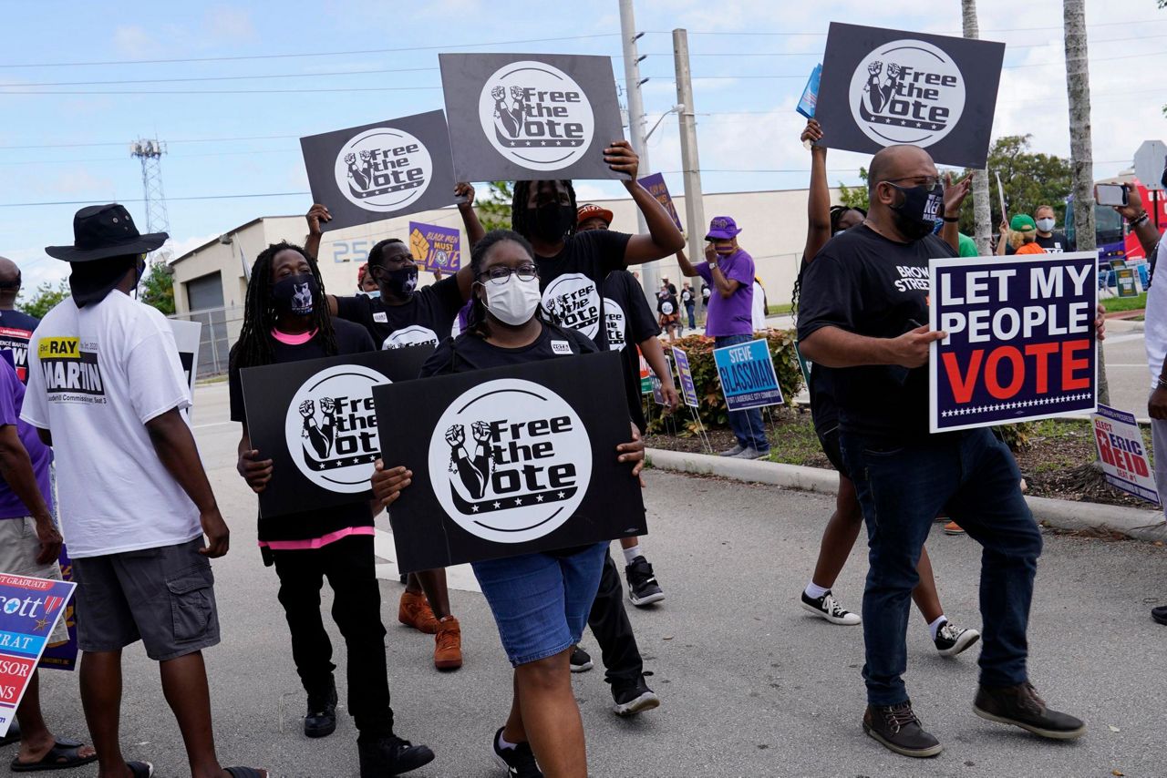 Black men's votes courted, as some search for political home