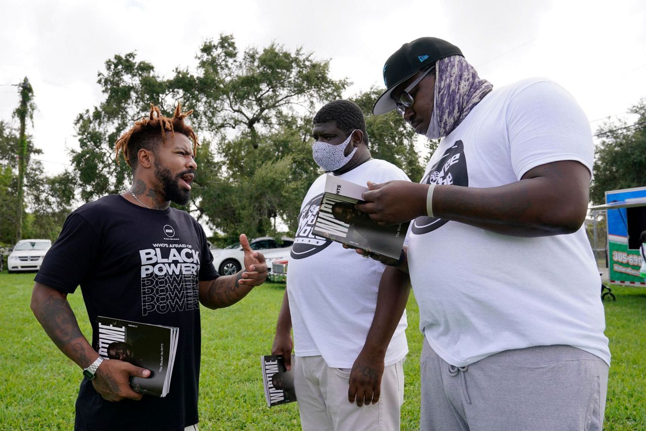 Black men's votes courted, as some search for political home
