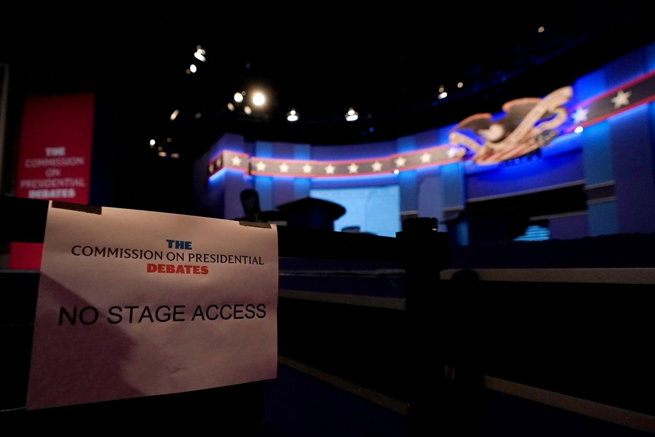 Scene for VP debate: Red, white and blue — and plexiglass
