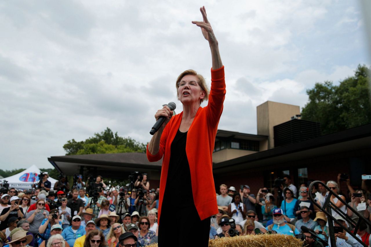 Warren wows in Iowa as candidates' sprint to caucuses begins