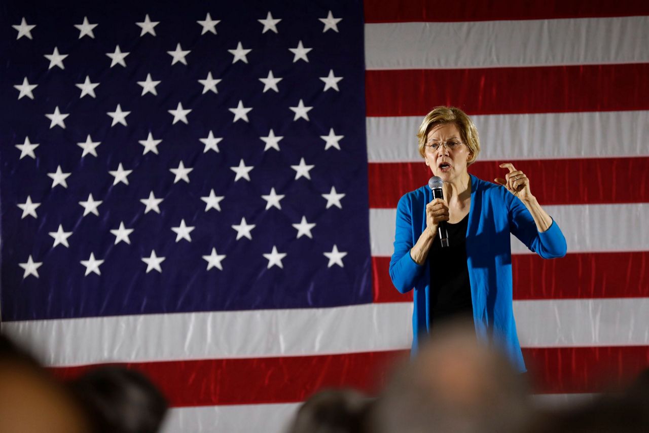 Warren finds 2020 footing selling policy with personal touch