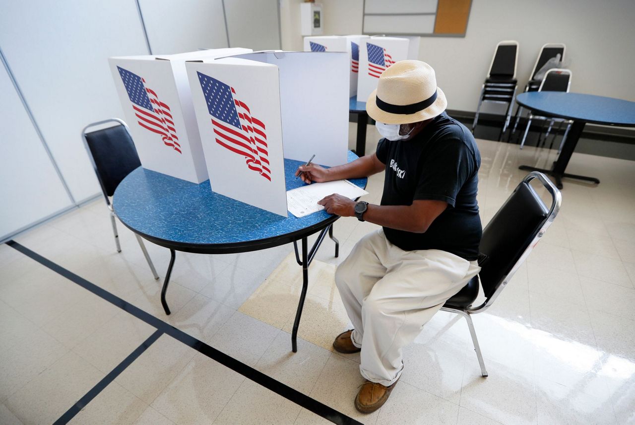 Iowa primary voters deciding King's fate, Ernst's challenger