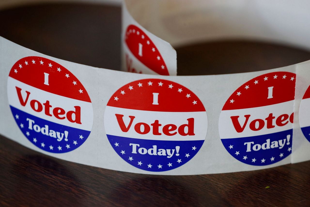 Iowa primary voters deciding King's fate, Ernst's challenger