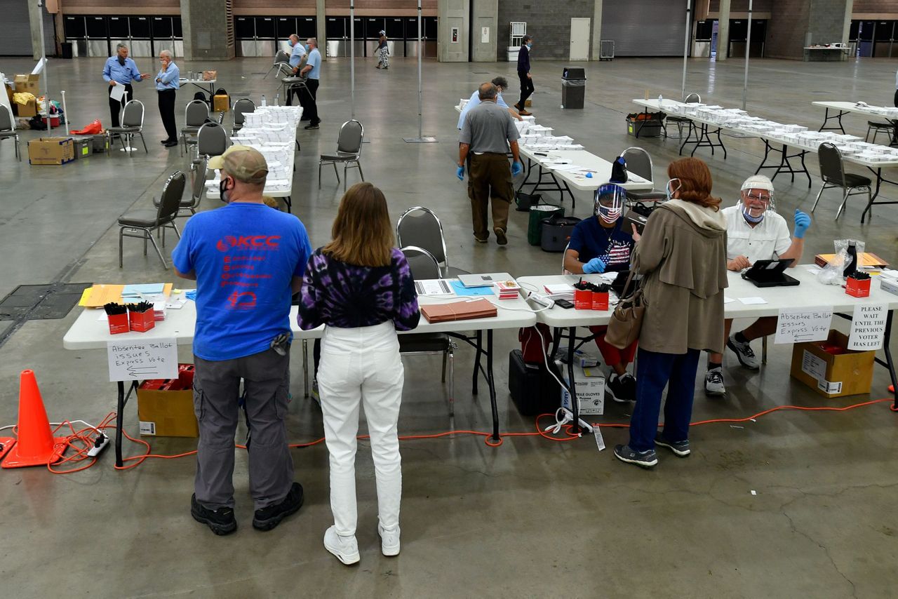 In NY, KY primaries, mail-in deluge and lines in Louisville