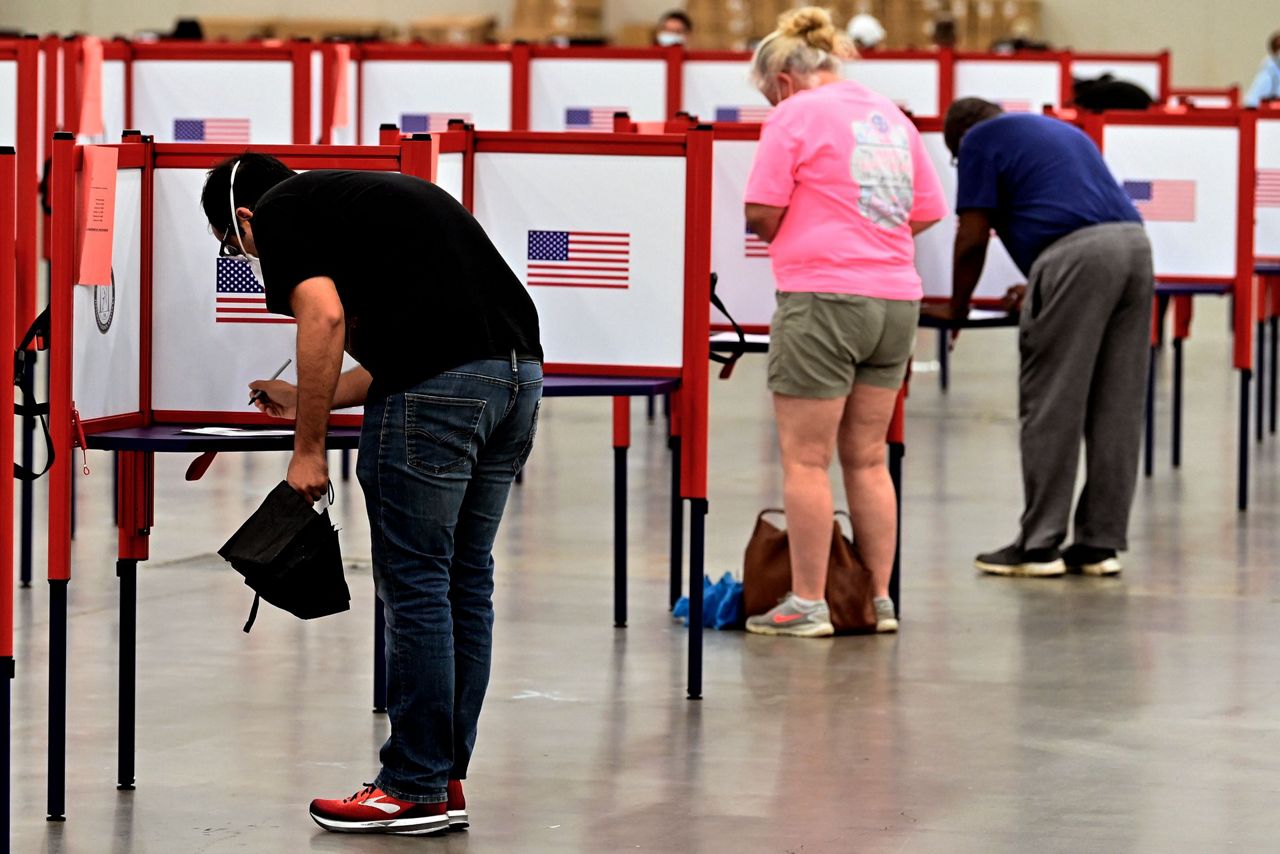 In NY, KY primaries, mail-in deluge and lines in Louisville