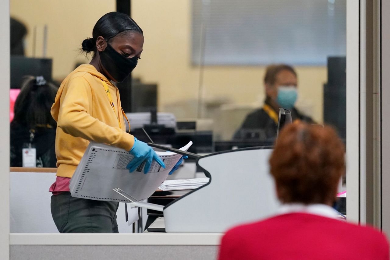 Poll watchers emerge as a flashpoint in battle over ballots