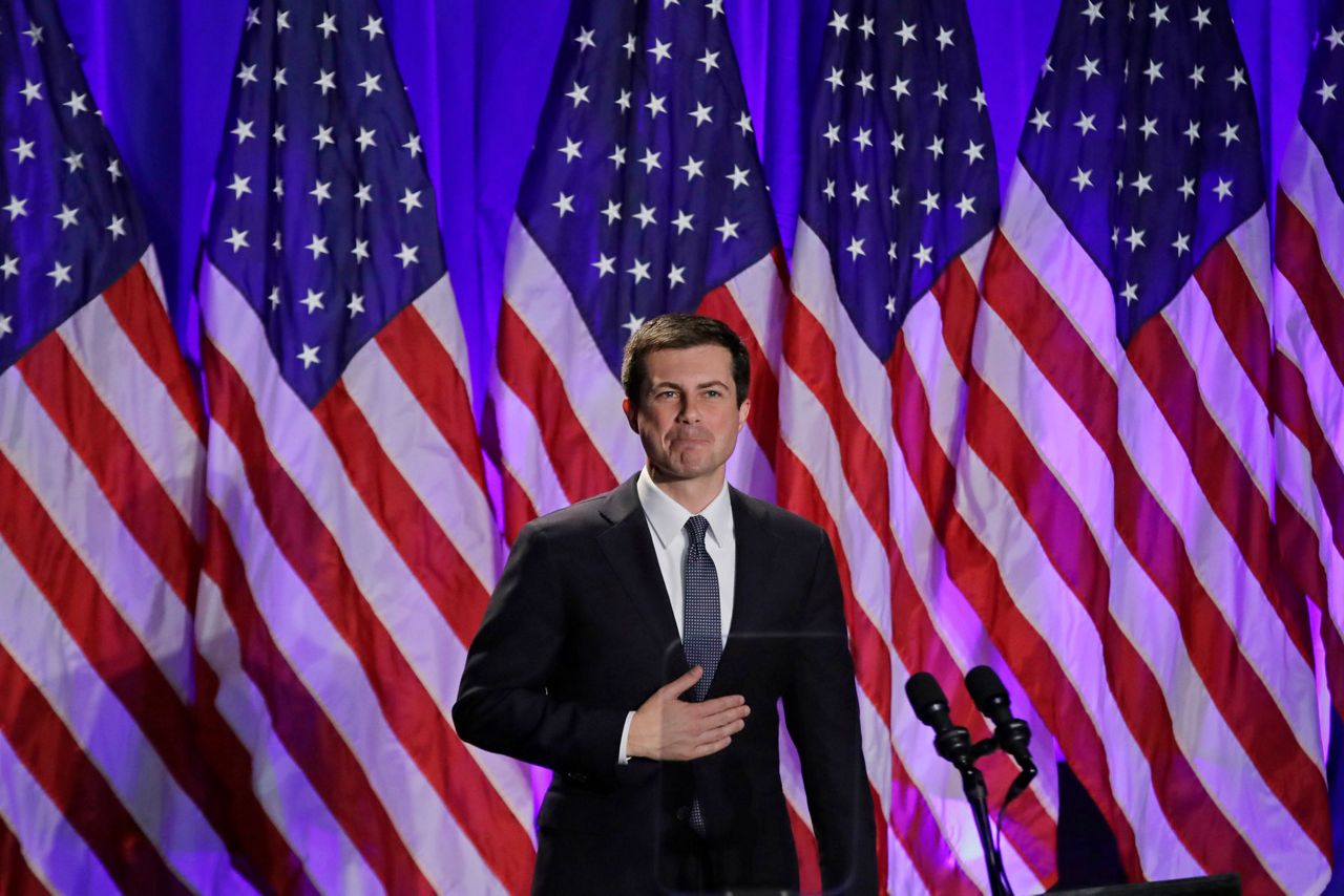 Buttigieg touts military service, wary of overstating role
