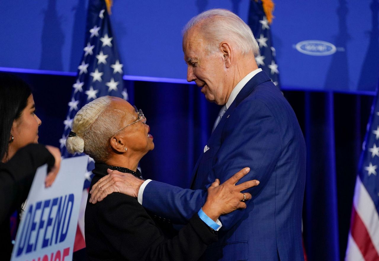 One hug and one selfie at a time, Biden's mission to connect