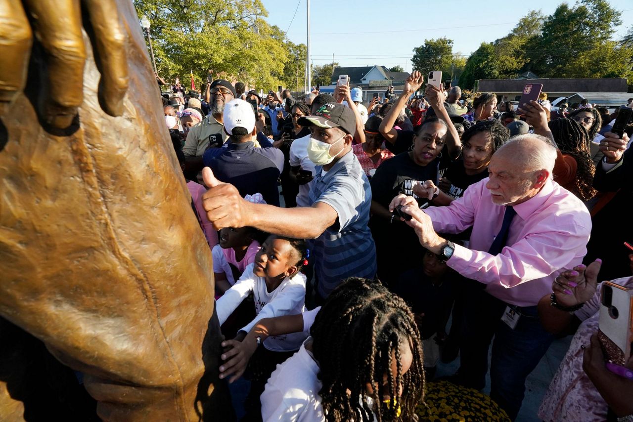 Community with Confederate monument gets Emmett Till statue