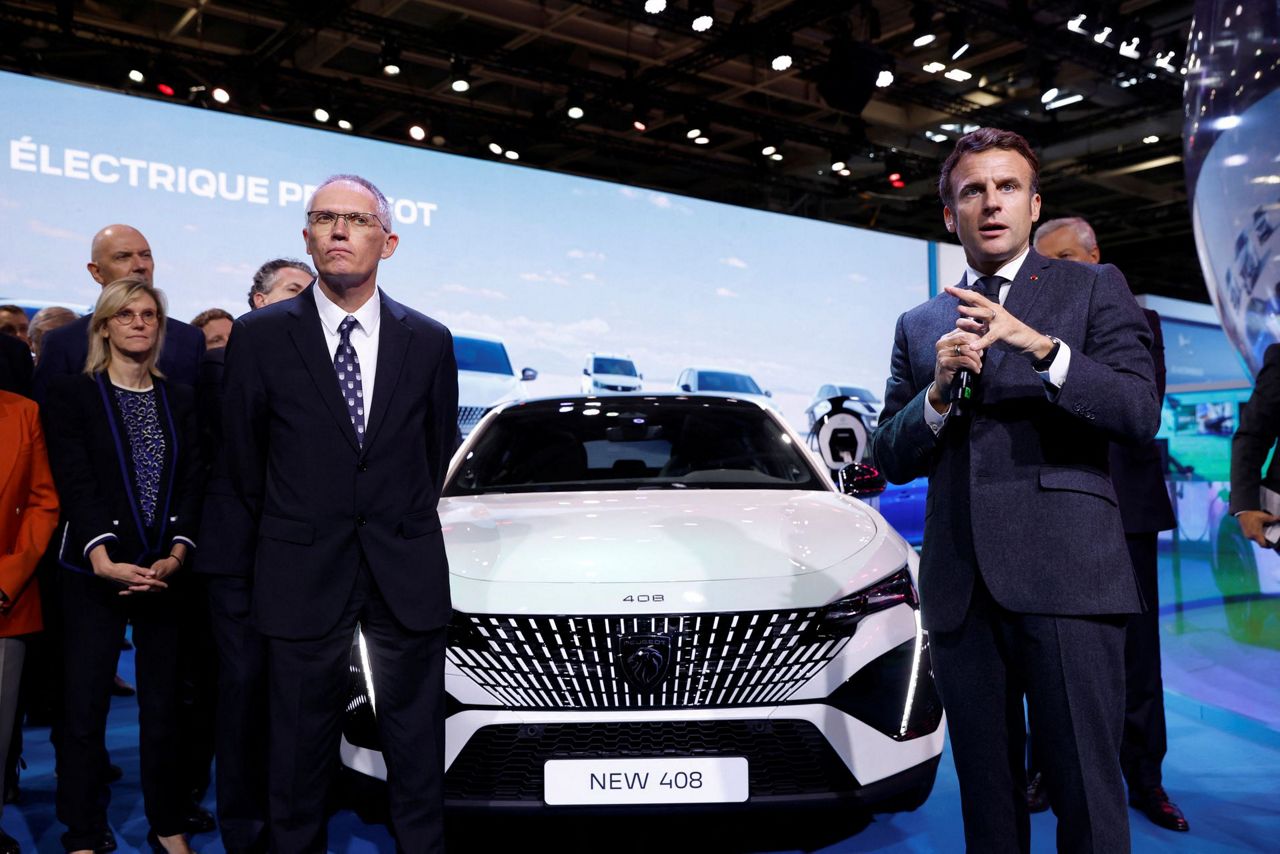 Electric vehicles take center stage at pared-back Paris show