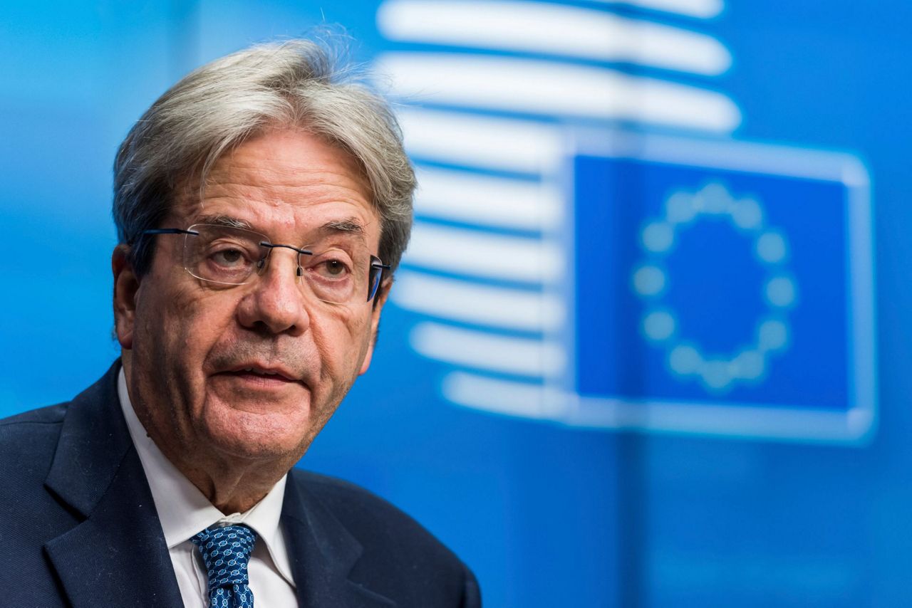 EU foresees economy improving, but inflation still painful