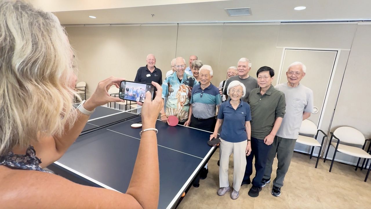 Seniors connect through the game of ping pong