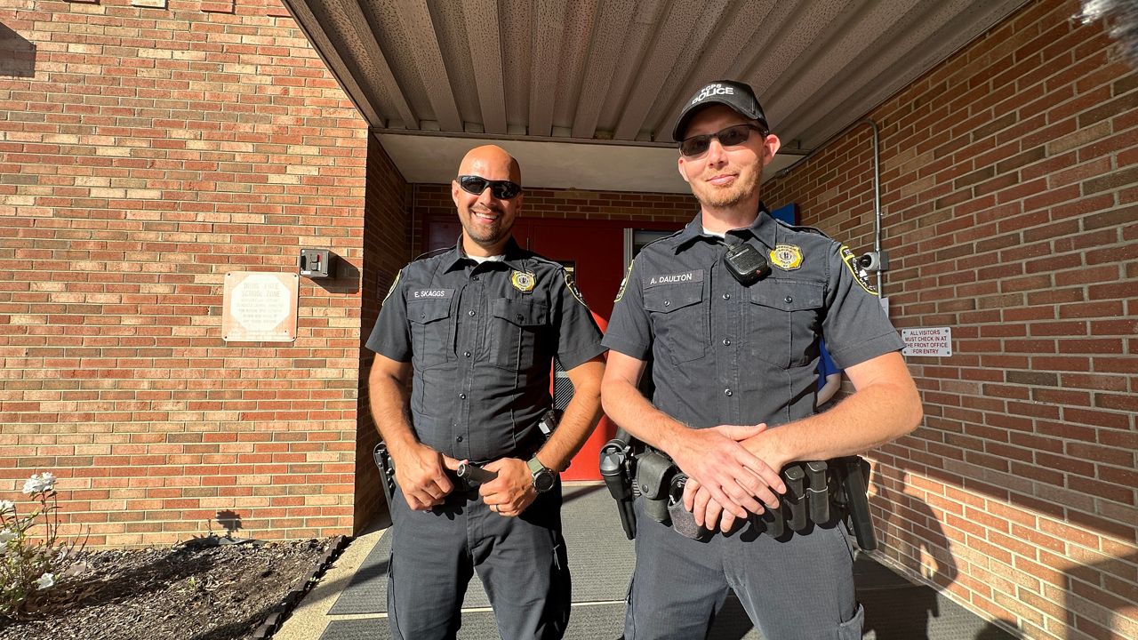 FCPS resource officer greeting students once again