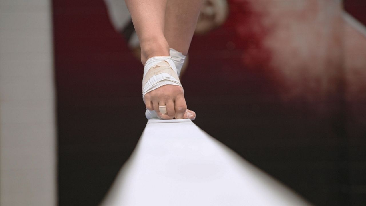 Review: In 'Athlete A,' an abuse scandal at USA Gymnastics
