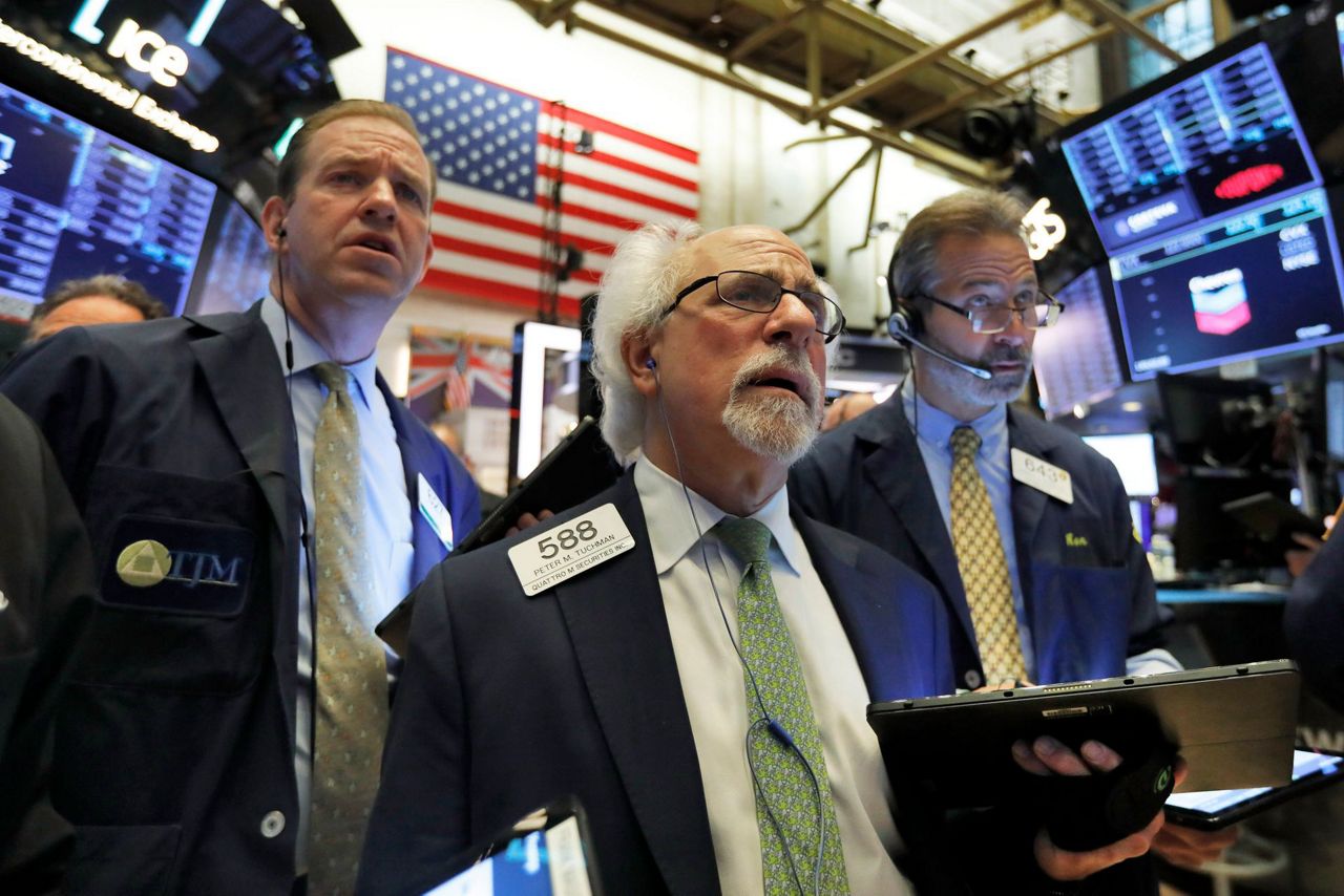 Stock trading is muted as investors wait for Fed statement