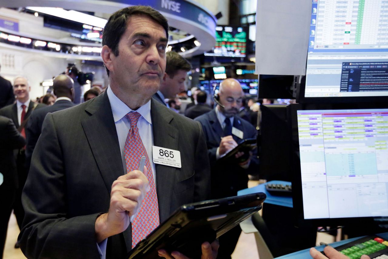 Stocks slip even as S&P 500 index marks its longest bull run