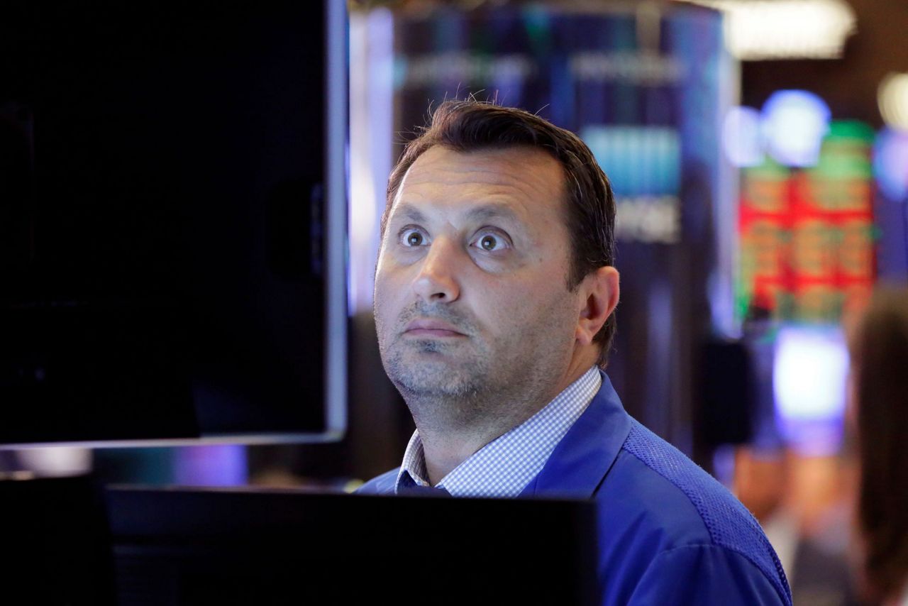 Stocks slip even as S&P 500 index marks its longest bull run
