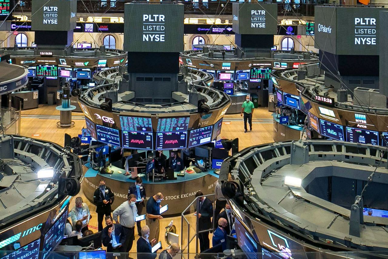 Secretive, never profitable Palantir makes its market debut