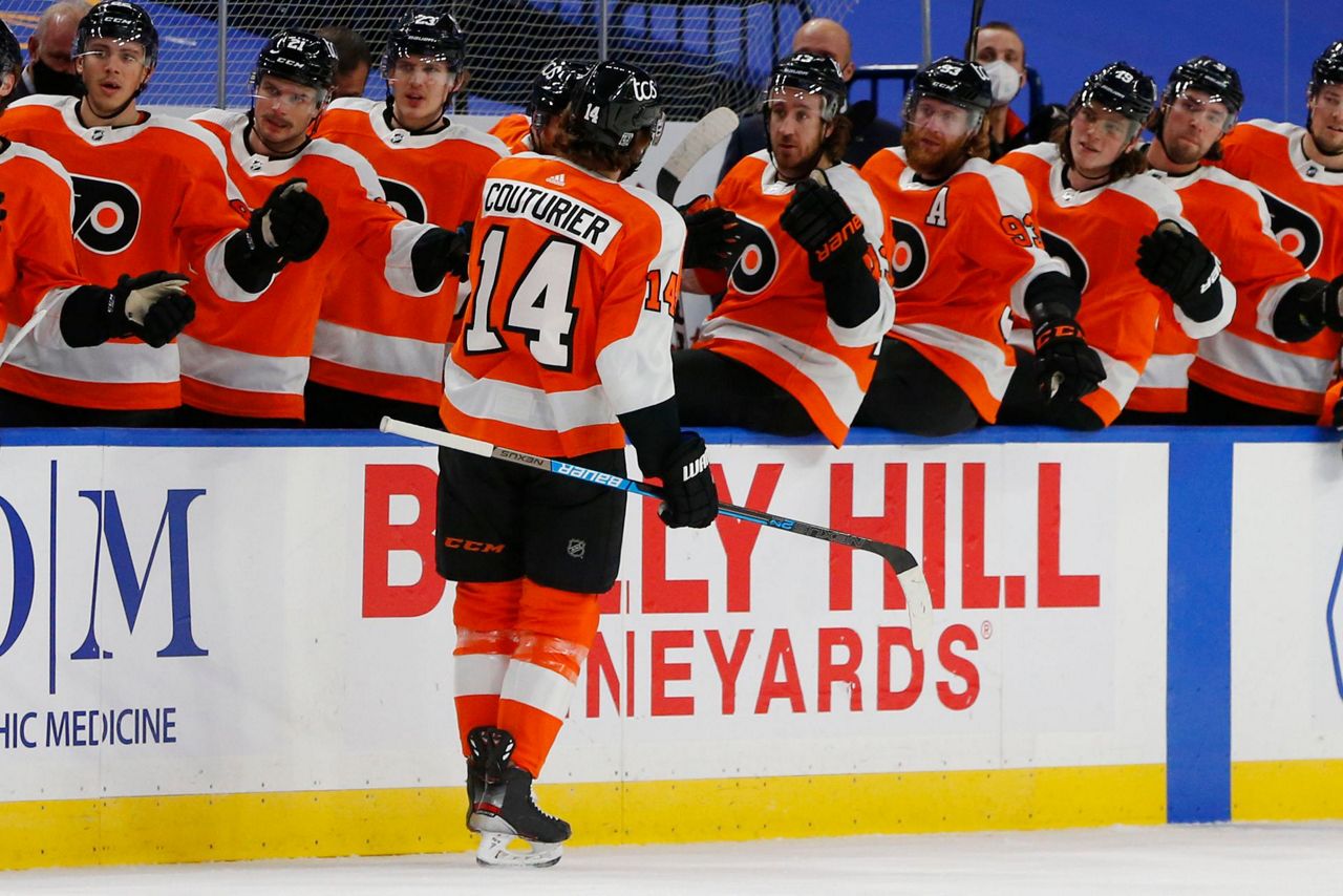 Elliott stops 23 shots in Flyers' 3-0 win over Sabres