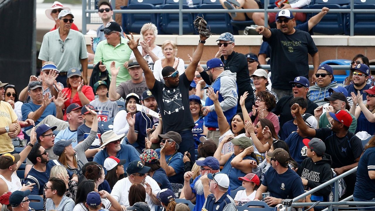 What a play! Fan grabs foul ball in cup, chugs the beer
