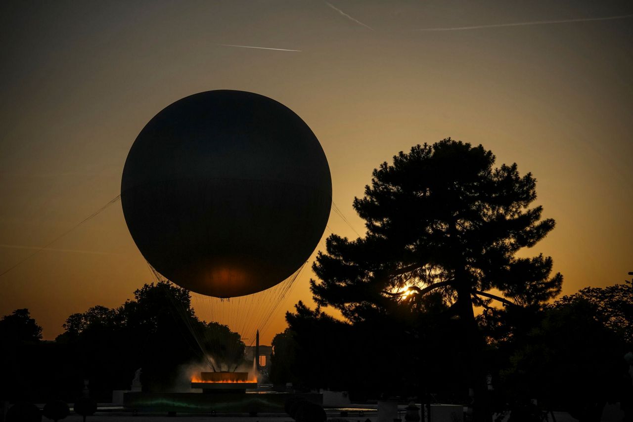 Paris' iconic cauldron from the Olympic Games returns to light up ...